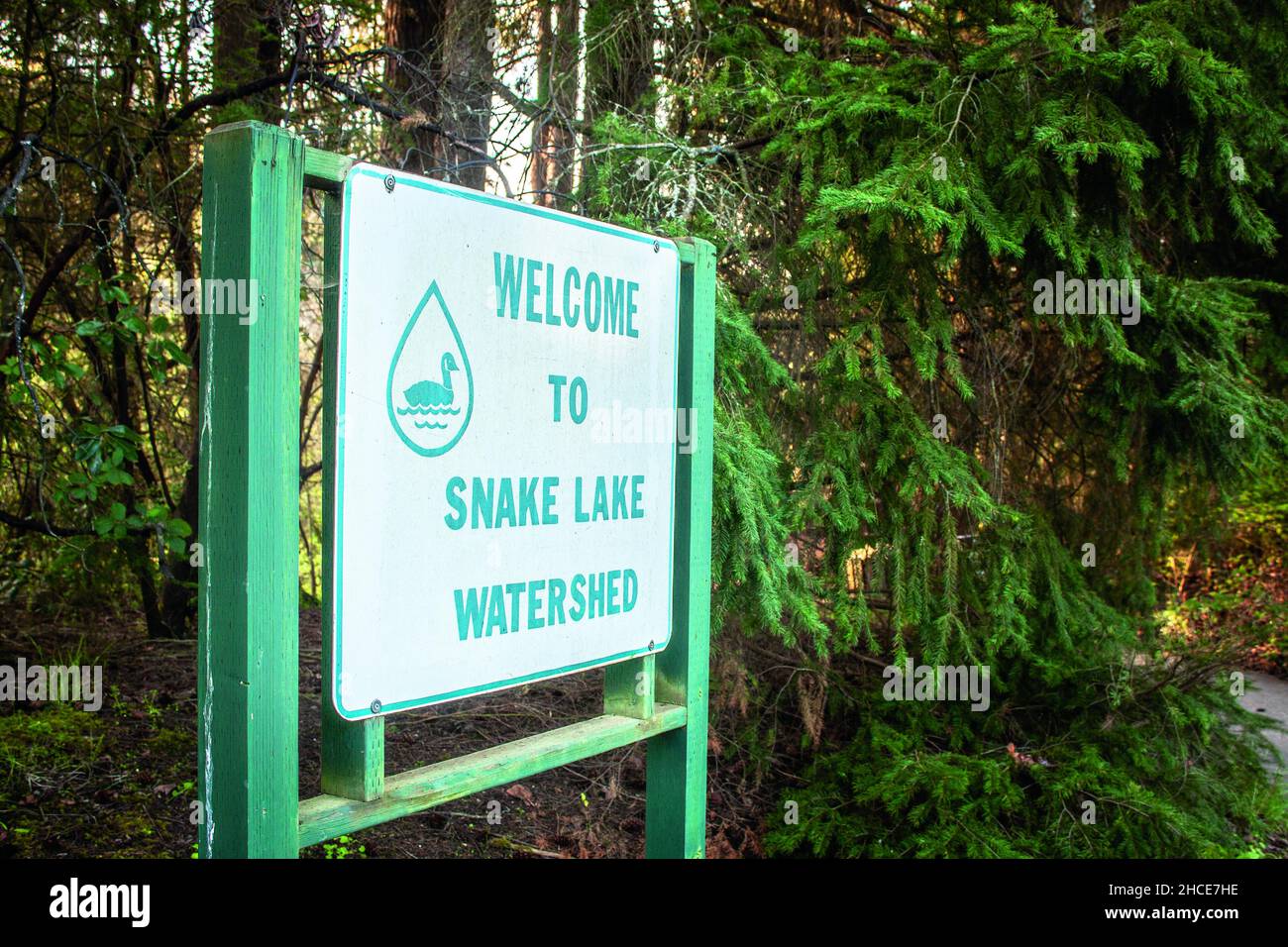 Closeup of the signboard with the writing of "Welcome to shake lake ...