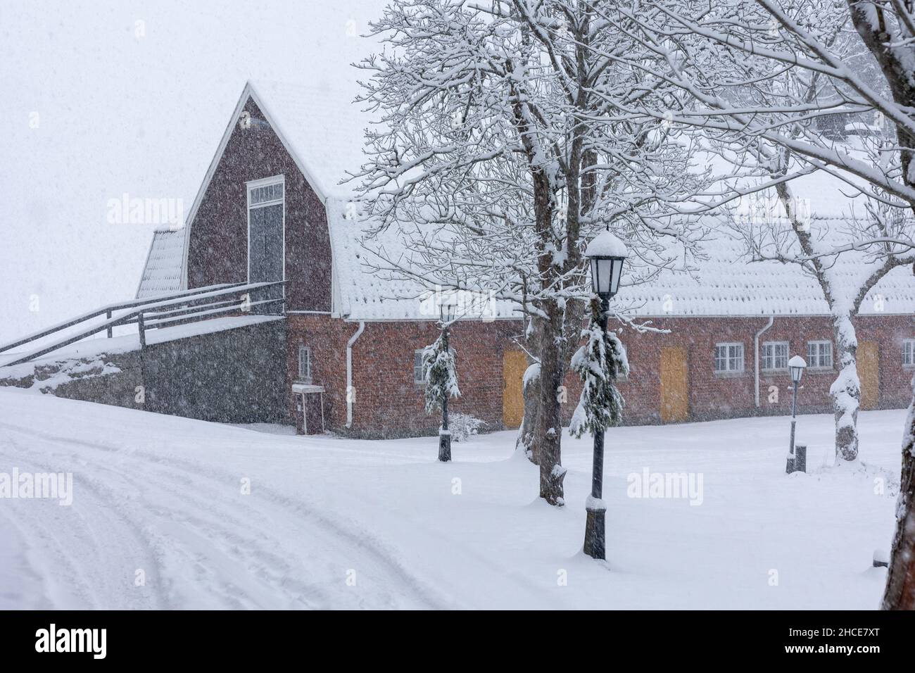 Traditional finnish buildings at winter in Vanhalinna Scenic area in ...