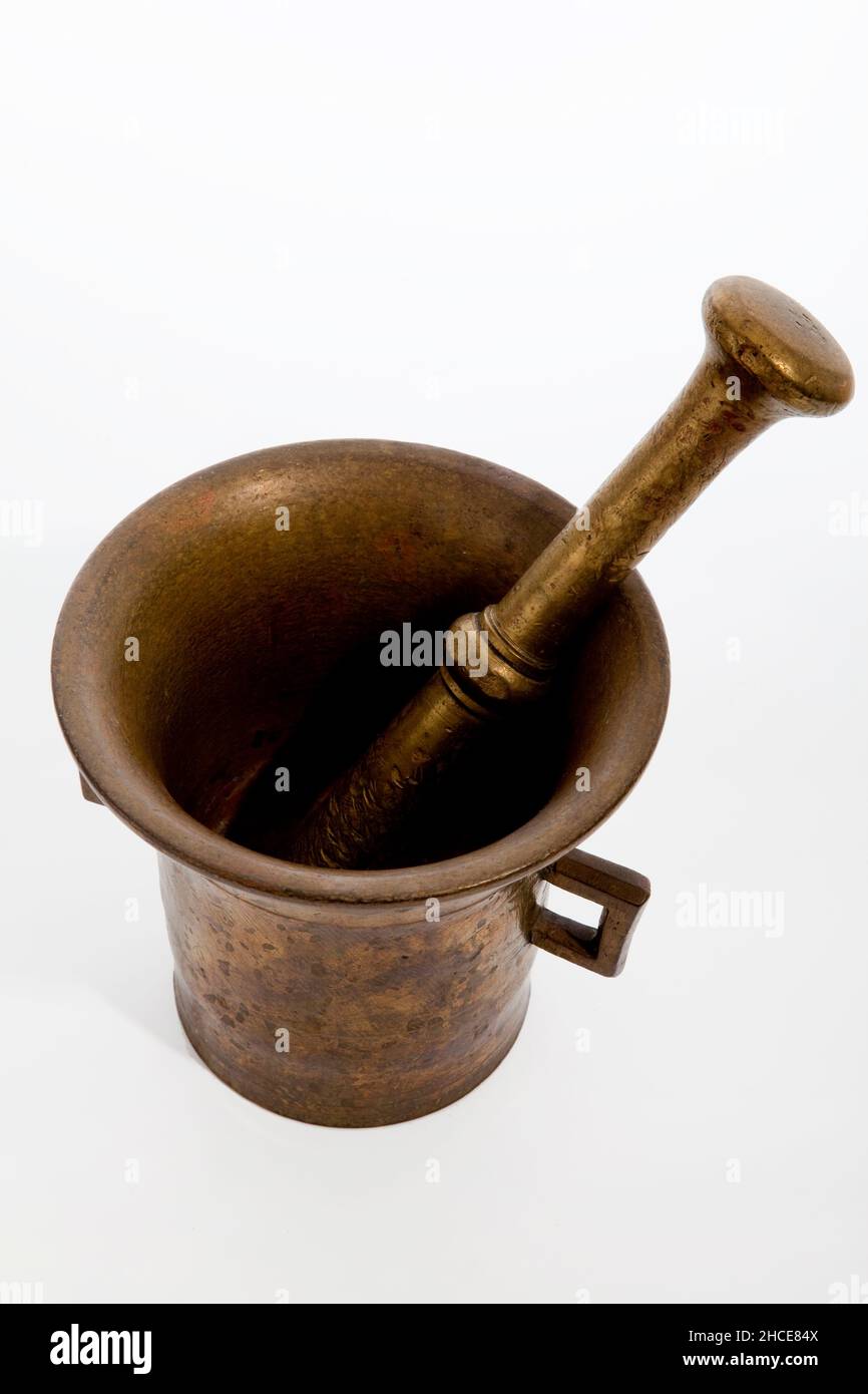 Cutout of a pestle and mortar on white background Stock Photo - Alamy