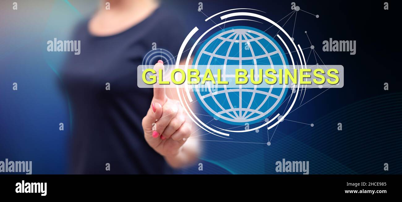 Woman touching global business concept on a touch screen with her ...