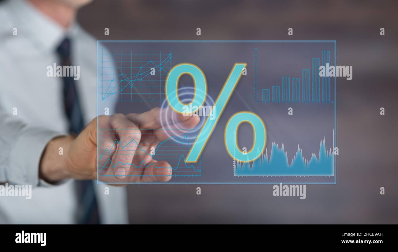 Man touching digital interest rates data on a touch screen with his ...
