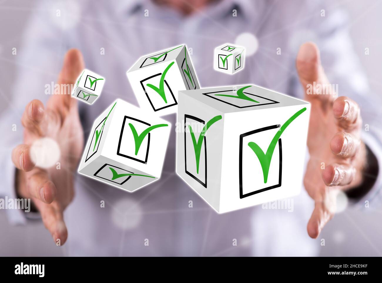Validation concept between hands of a man in background Stock Photo - Alamy