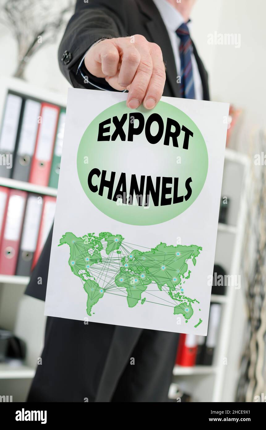 Paper showing export channels concept held by a businessman Stock Photo ...