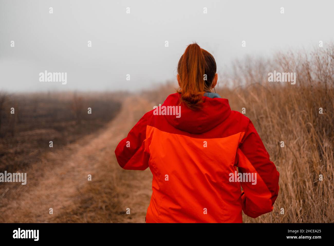 Happy sportive woman exercising outdoors in nature in the morning ...