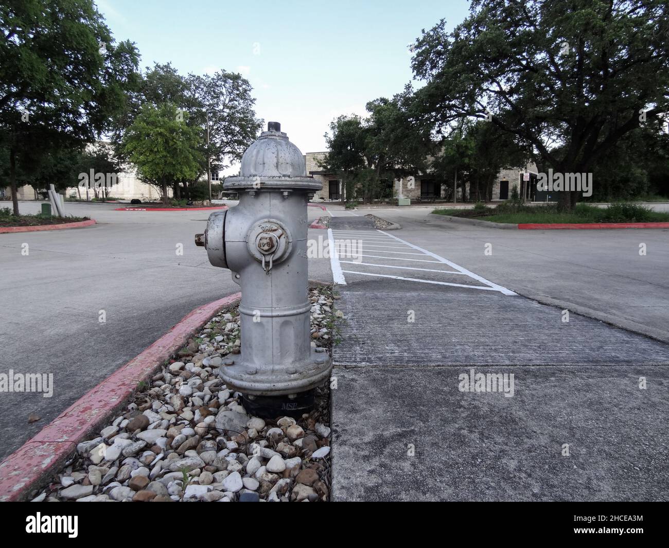 Weathered fire hydrant by the road Stock Photo - Alamy