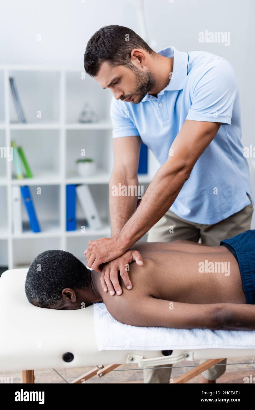 Interracial massage hi-res stock photography and images - Alamy