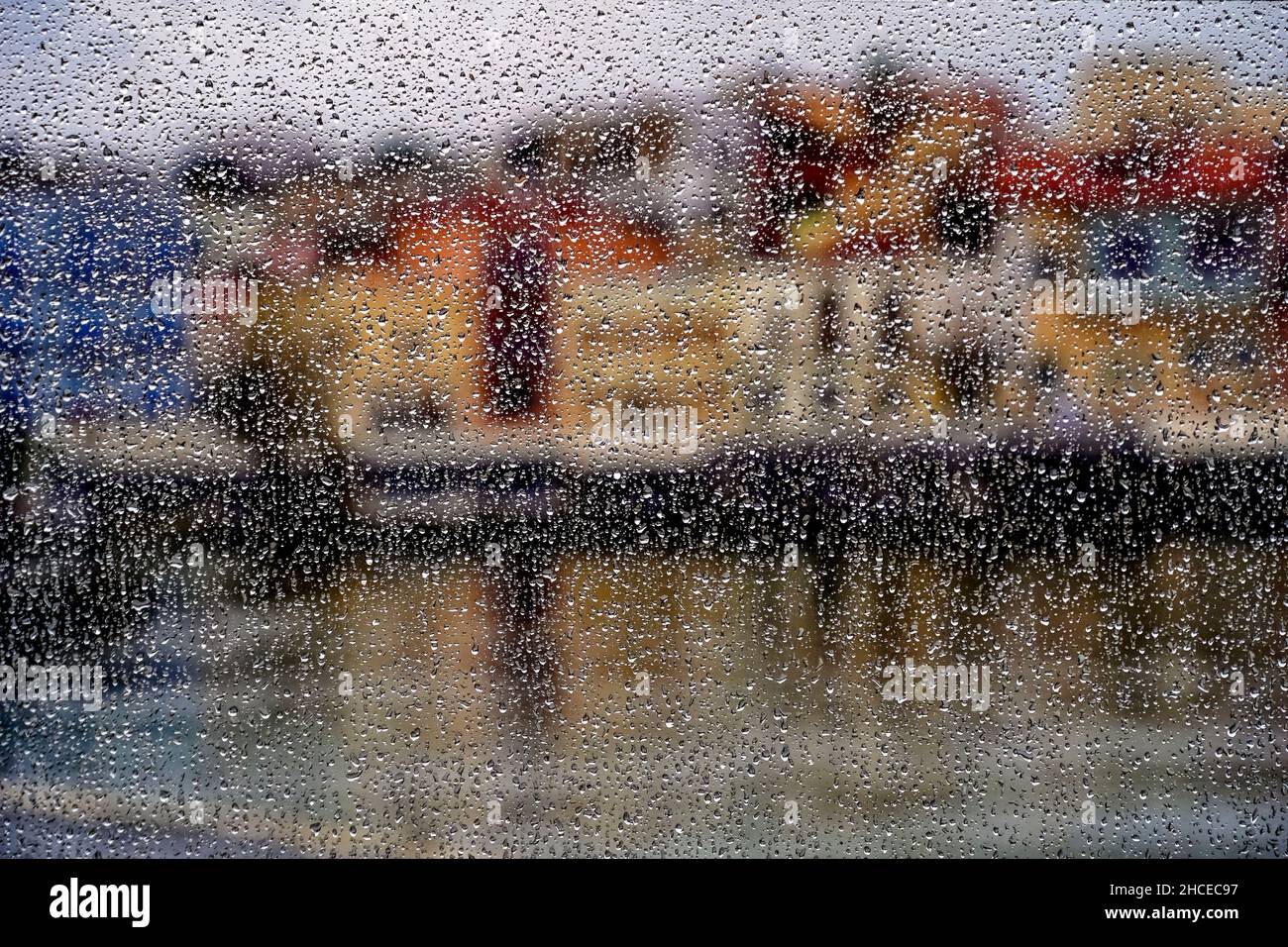 Cityscape of Chania, Crete, Greece As seen through a wet window on a ...