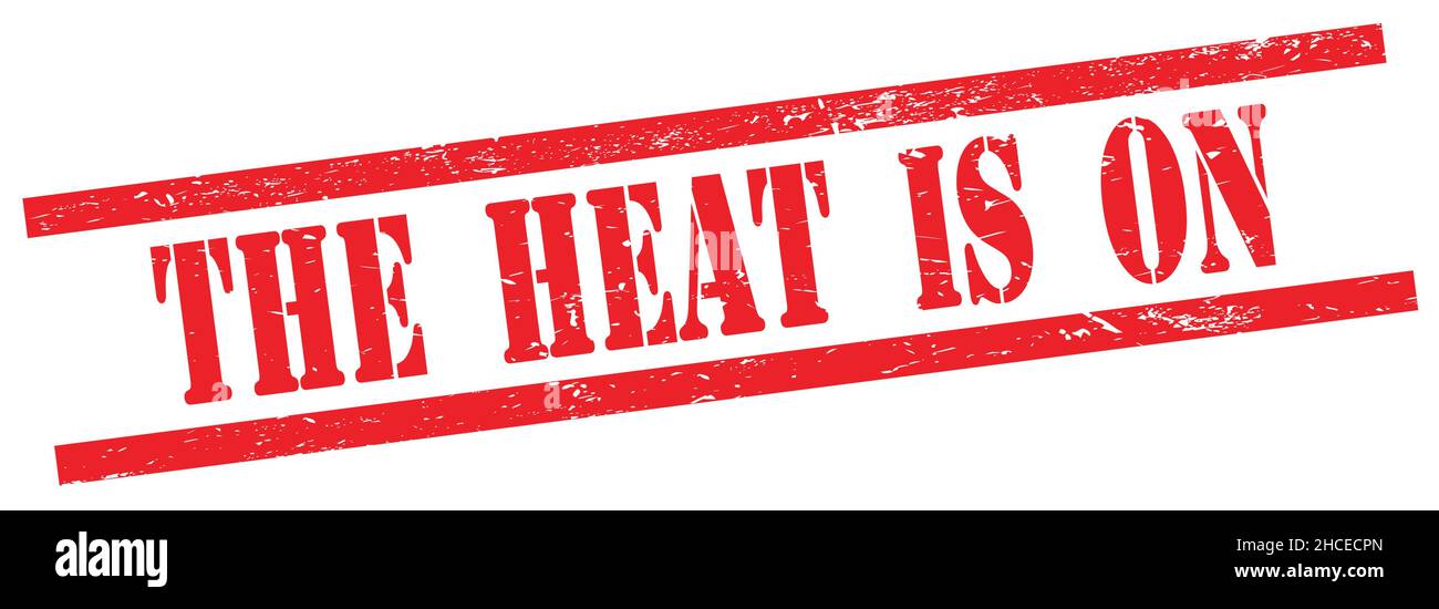 THE HEAT IS ON text on red grungy rectangle vintage stamp Stock Photo ...
