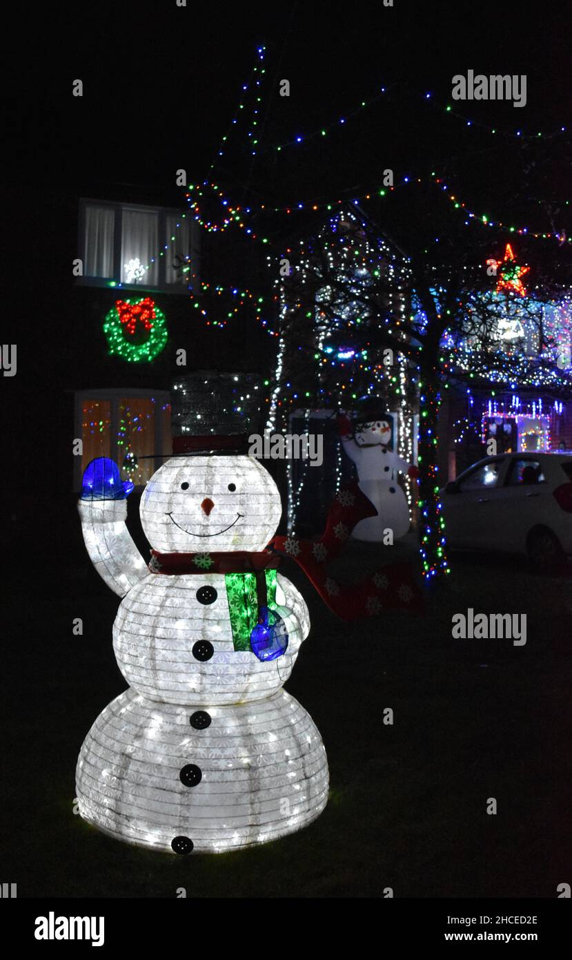 A smiling snowman at a Christmas display at someone's house Stock Photo ...