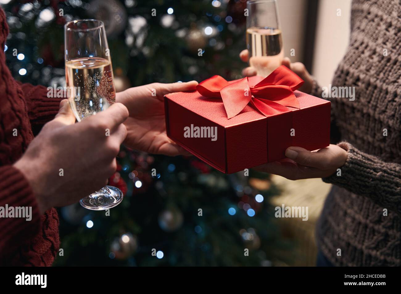 Female hand taking gift box hi-res stock photography and images - Alamy
