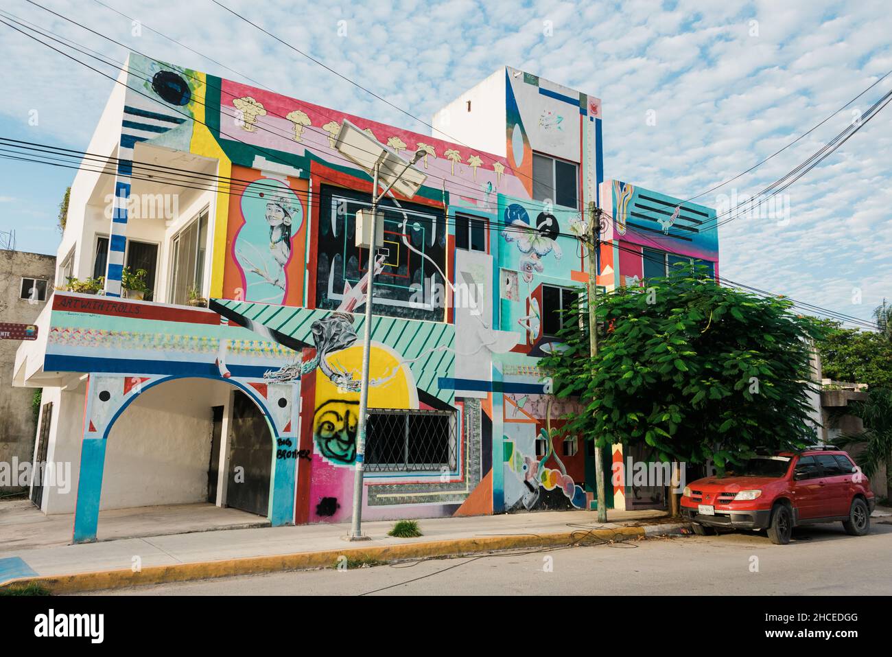 Colorful building with murals, in Tulum, Mexico Stock Photo - Alamy