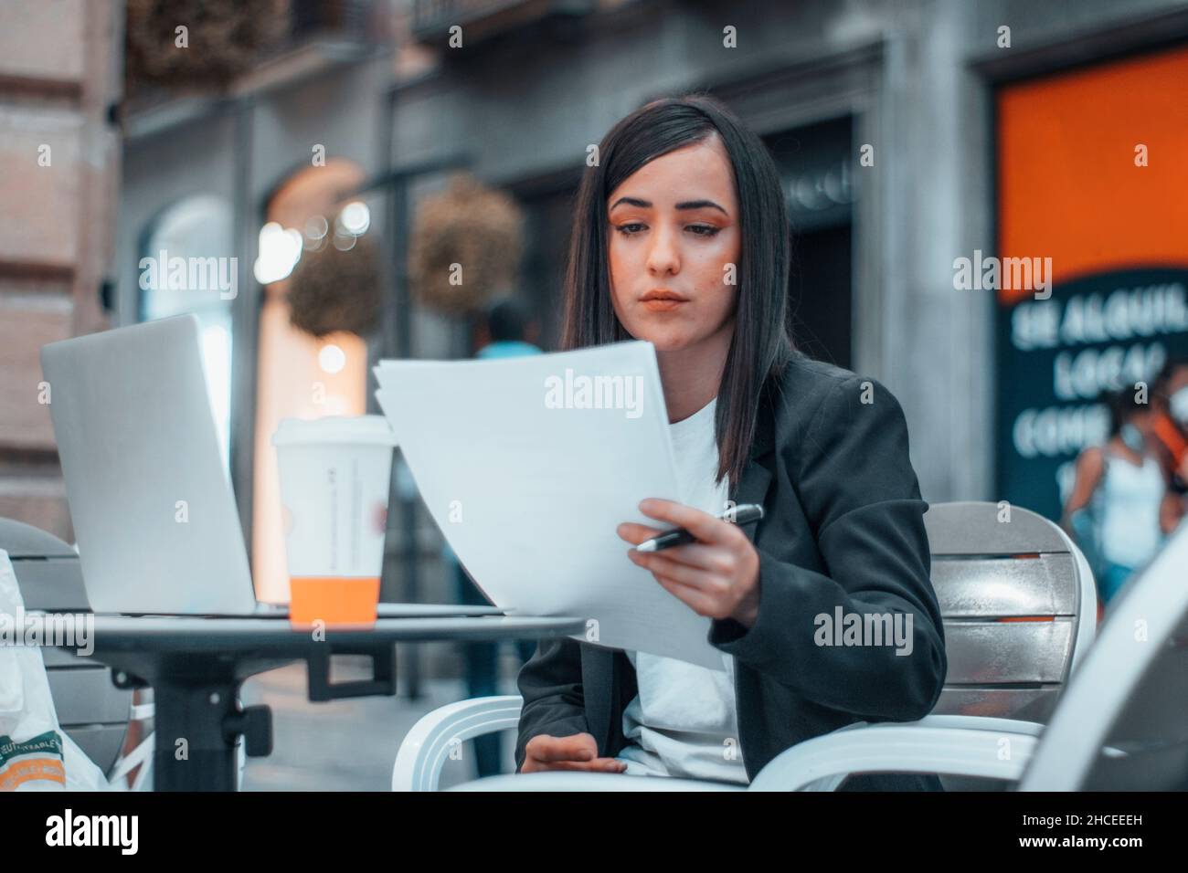 Manager with a happy smile reviewing their requests from her clients on ...