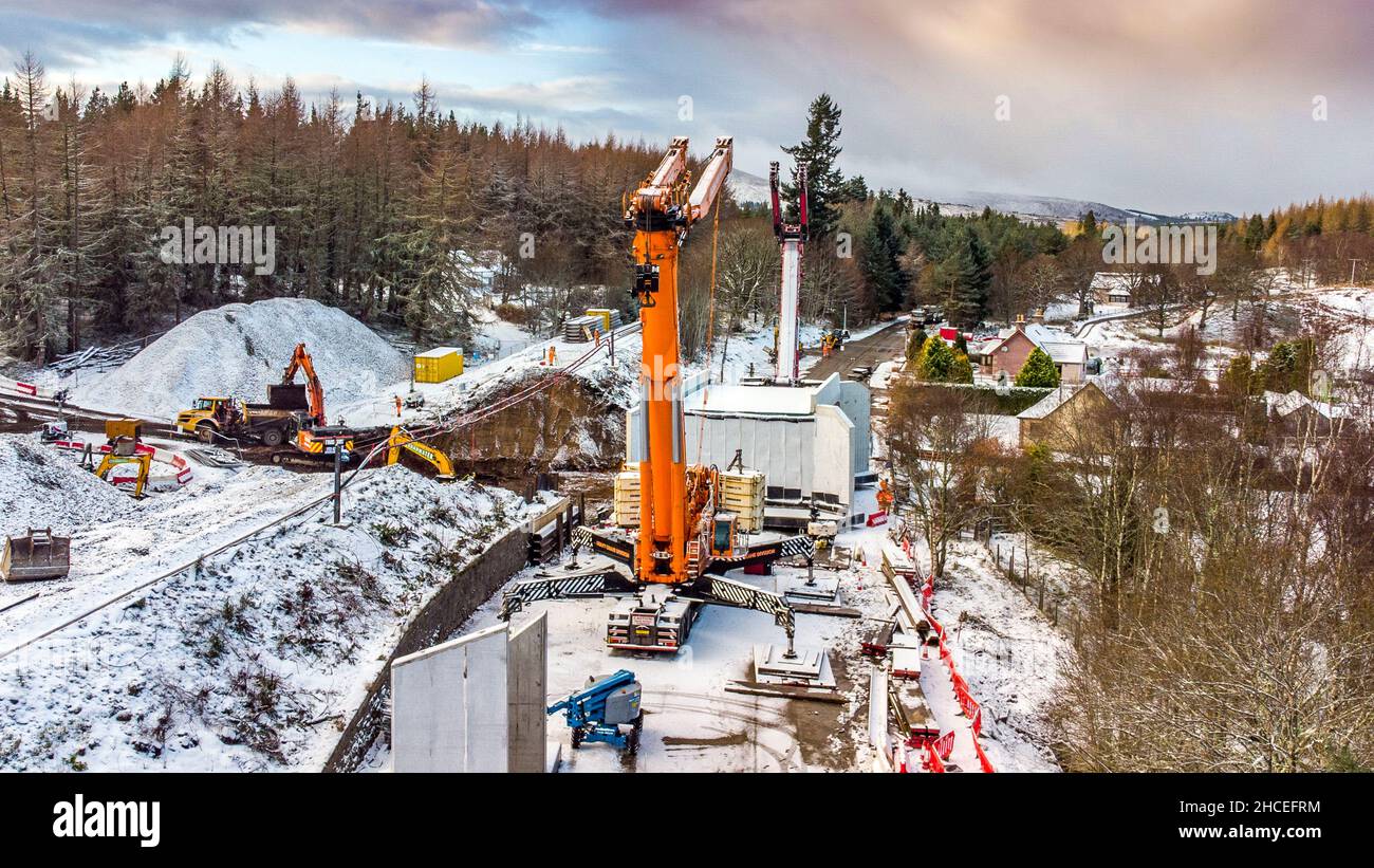 Railway workers building new railway and knocking down bridges Stock ...