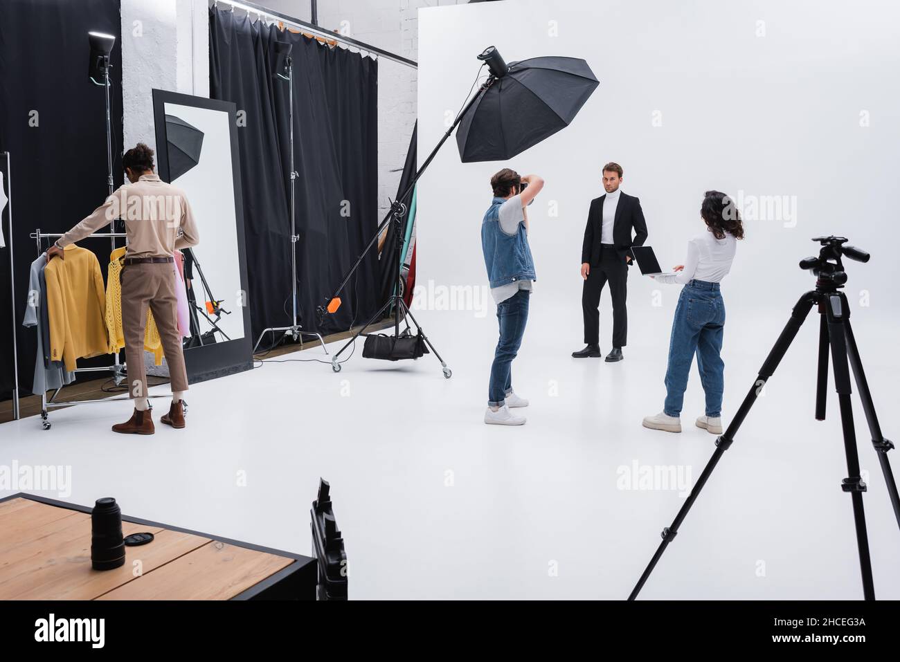 Backstage photo session posing woman hi-res stock photography and ...