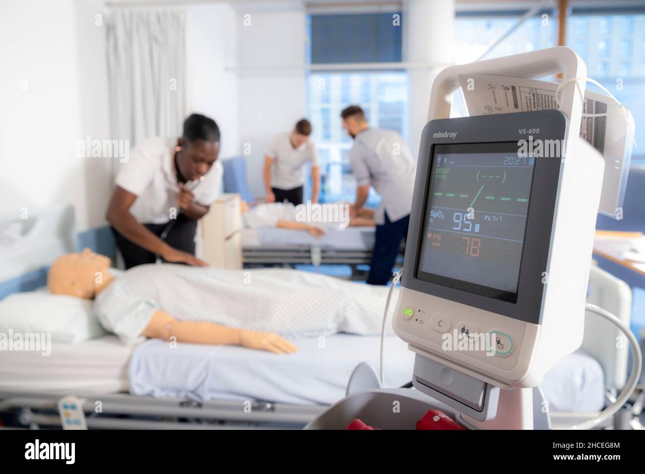 Student nurses training realistic medical dummy Stock Photo - Alamy