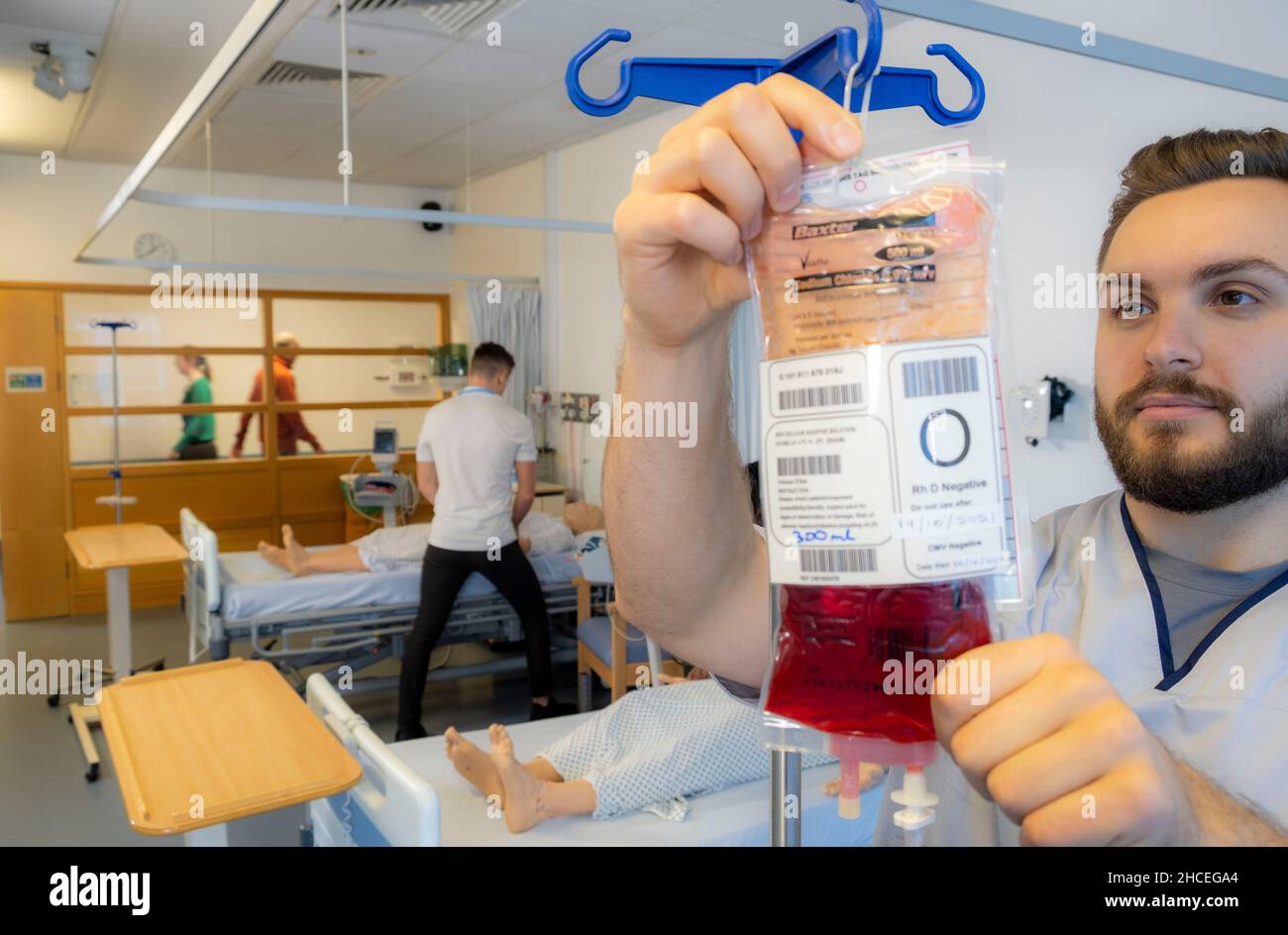 Student nurses training realistic medical dummy Stock Photo - Alamy