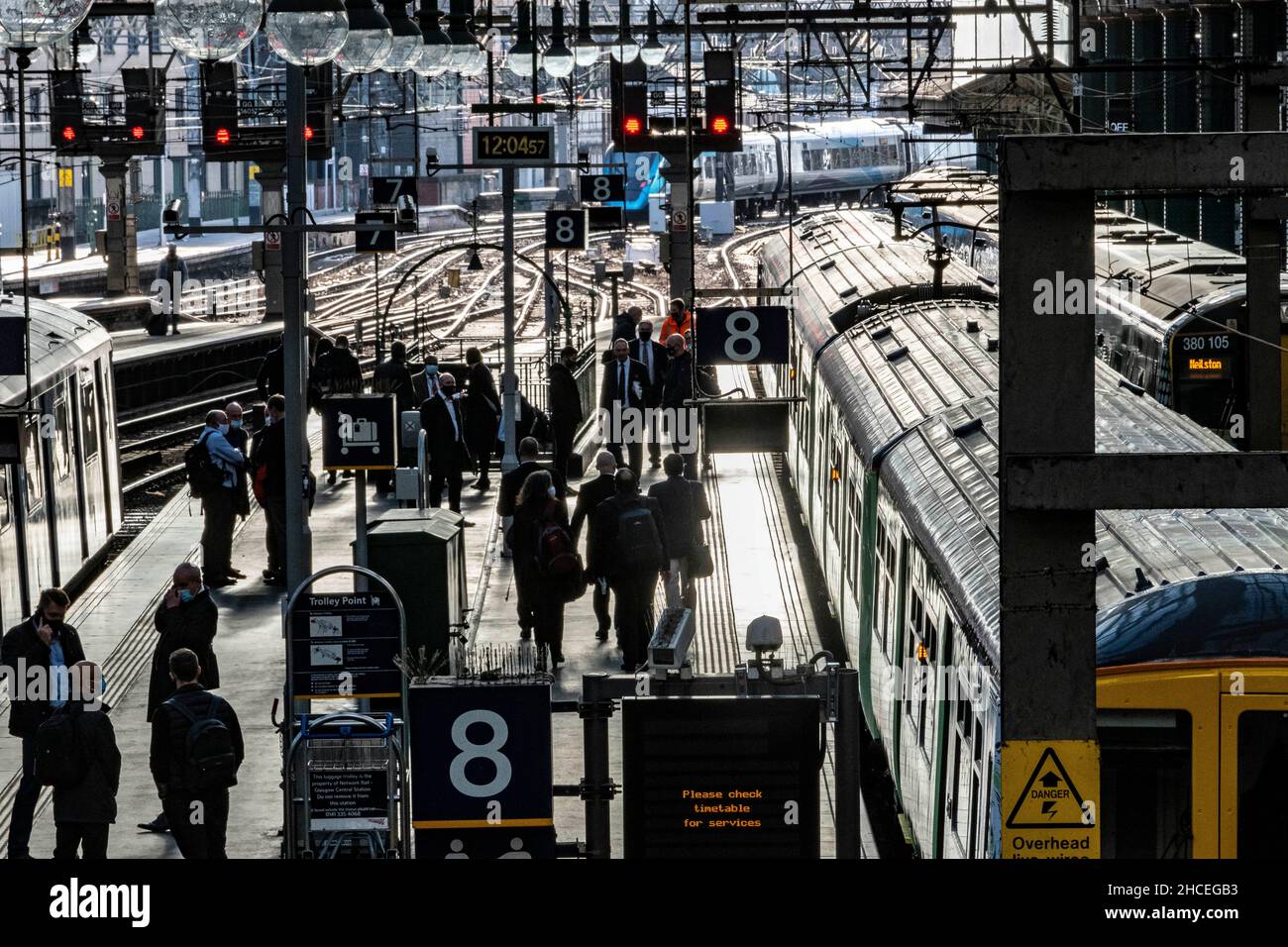 Commuters traveling on trains and in busy railway stations Stock Photo ...