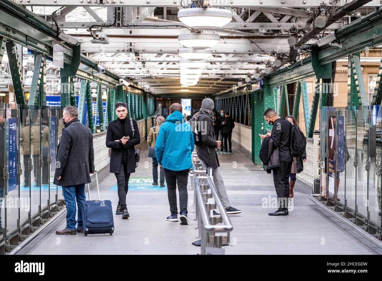 Commuters traveling on trains and in busy railway stations Stock Photo ...
