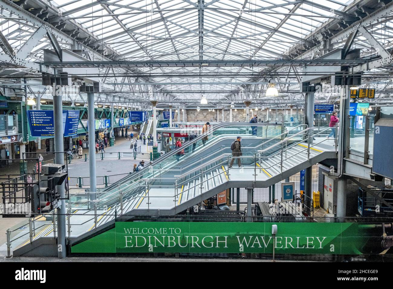 Commuters traveling on trains and in busy railway stations Stock Photo ...