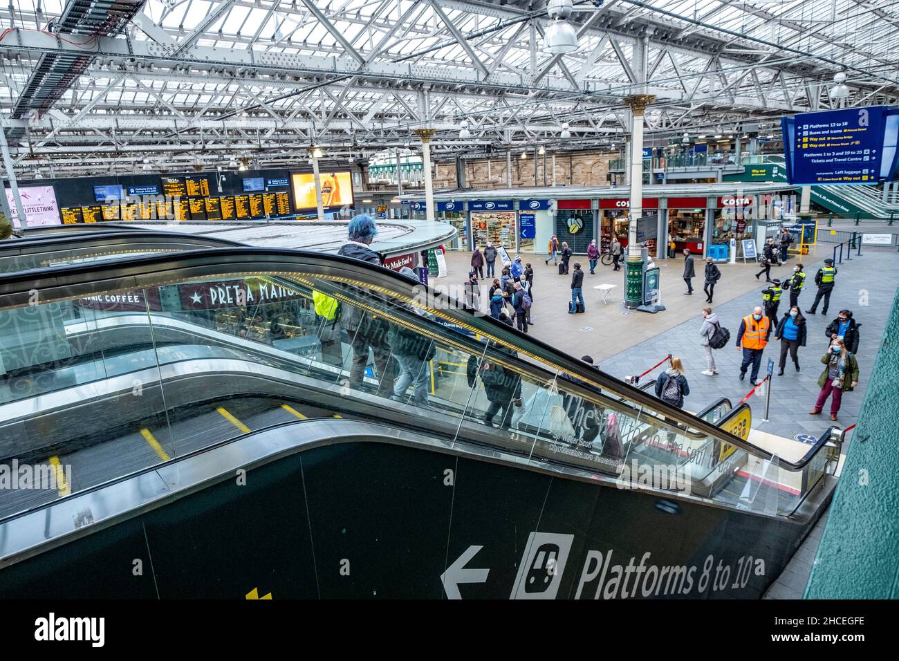 Commuters traveling on trains and in busy railway stations Stock Photo ...