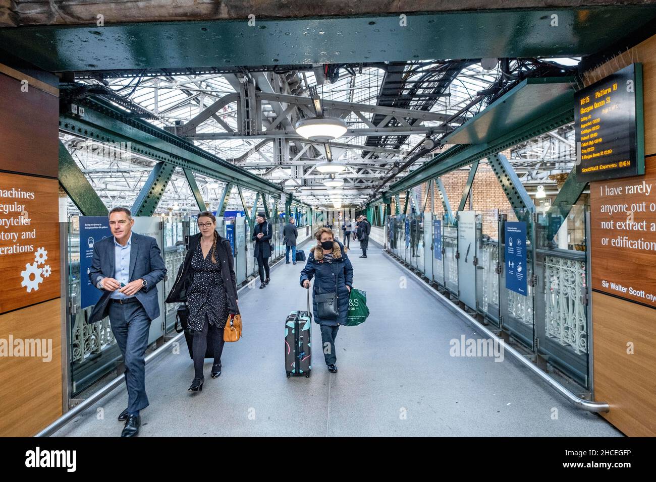Commuters traveling on trains and in busy railway stations Stock Photo ...