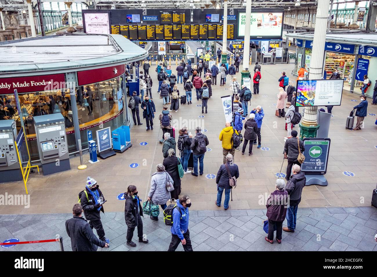 Commuters traveling on trains and in busy railway stations Stock Photo ...
