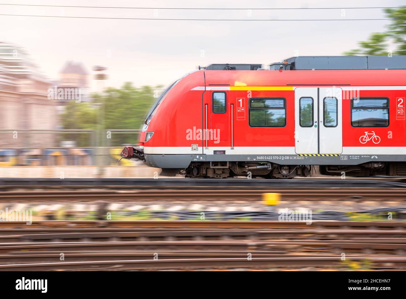 Electric train getting into a station. Blurred motion effect Stock ...