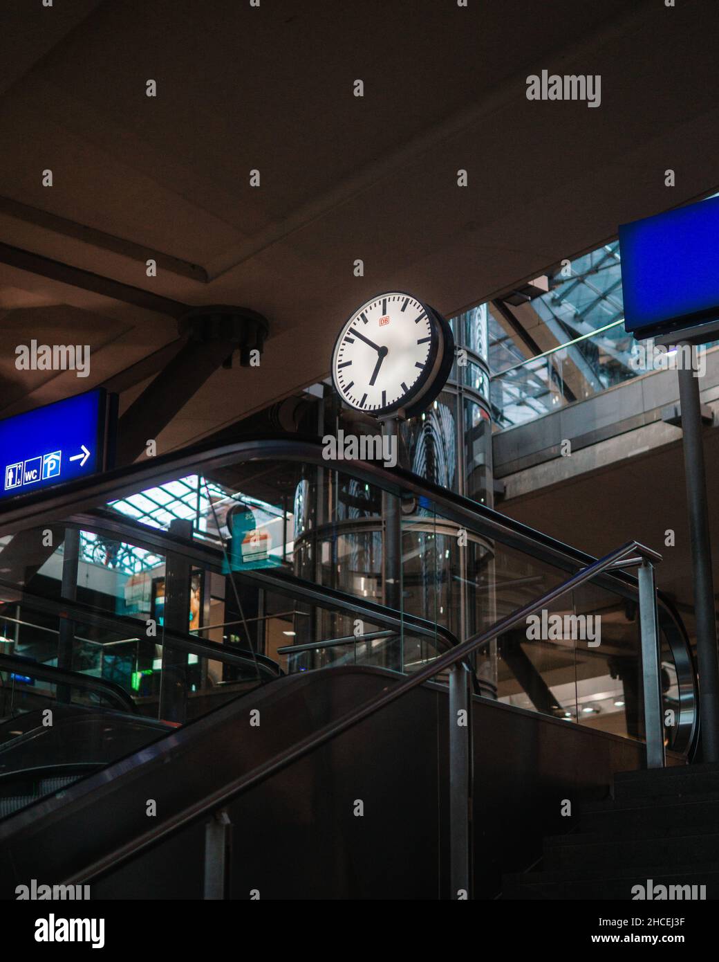 Vertical shot of the clock at the metro station Stock Photo - Alamy