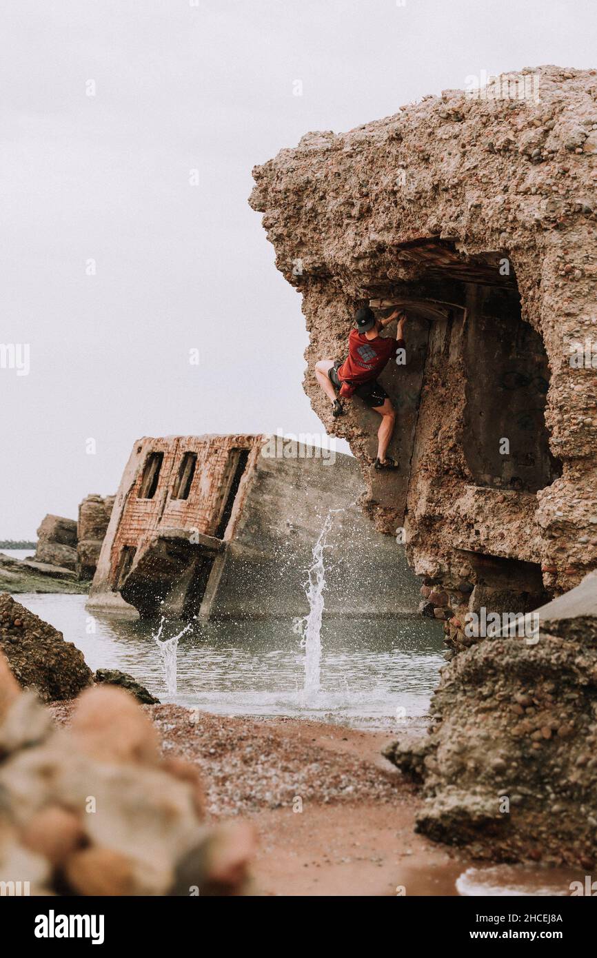 Over man climbing hi-res stock photography and images - Alamy