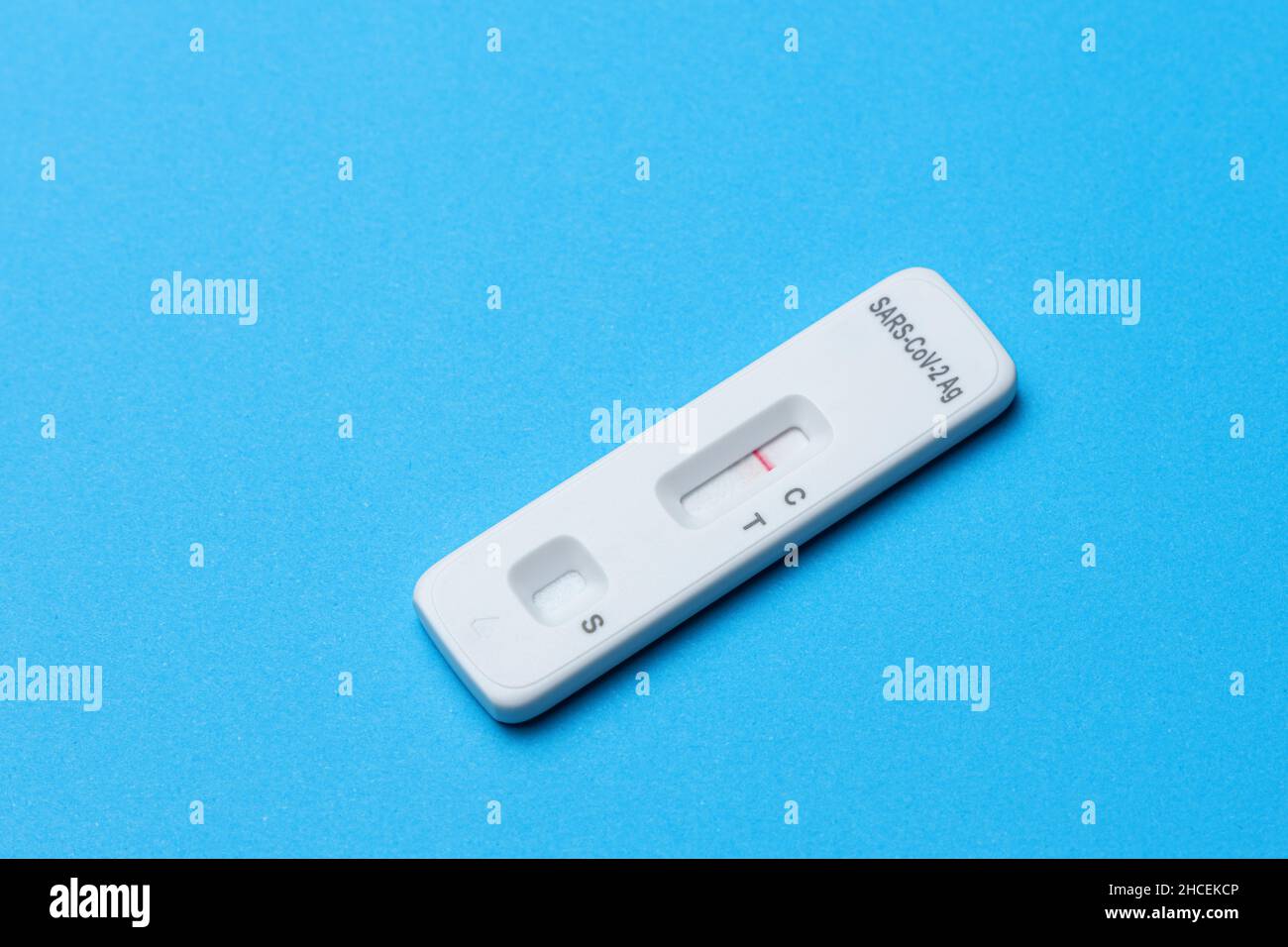 Negative antigen rapid test on blue background Stock Photo - Alamy