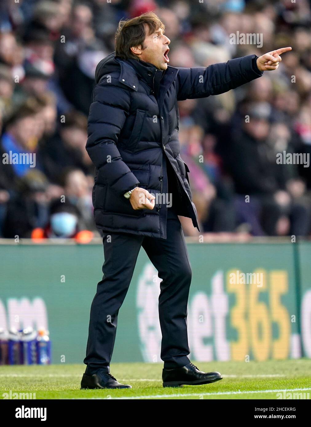 Tottenham Hotspur manager Antonio Conte instructs his players during ...
