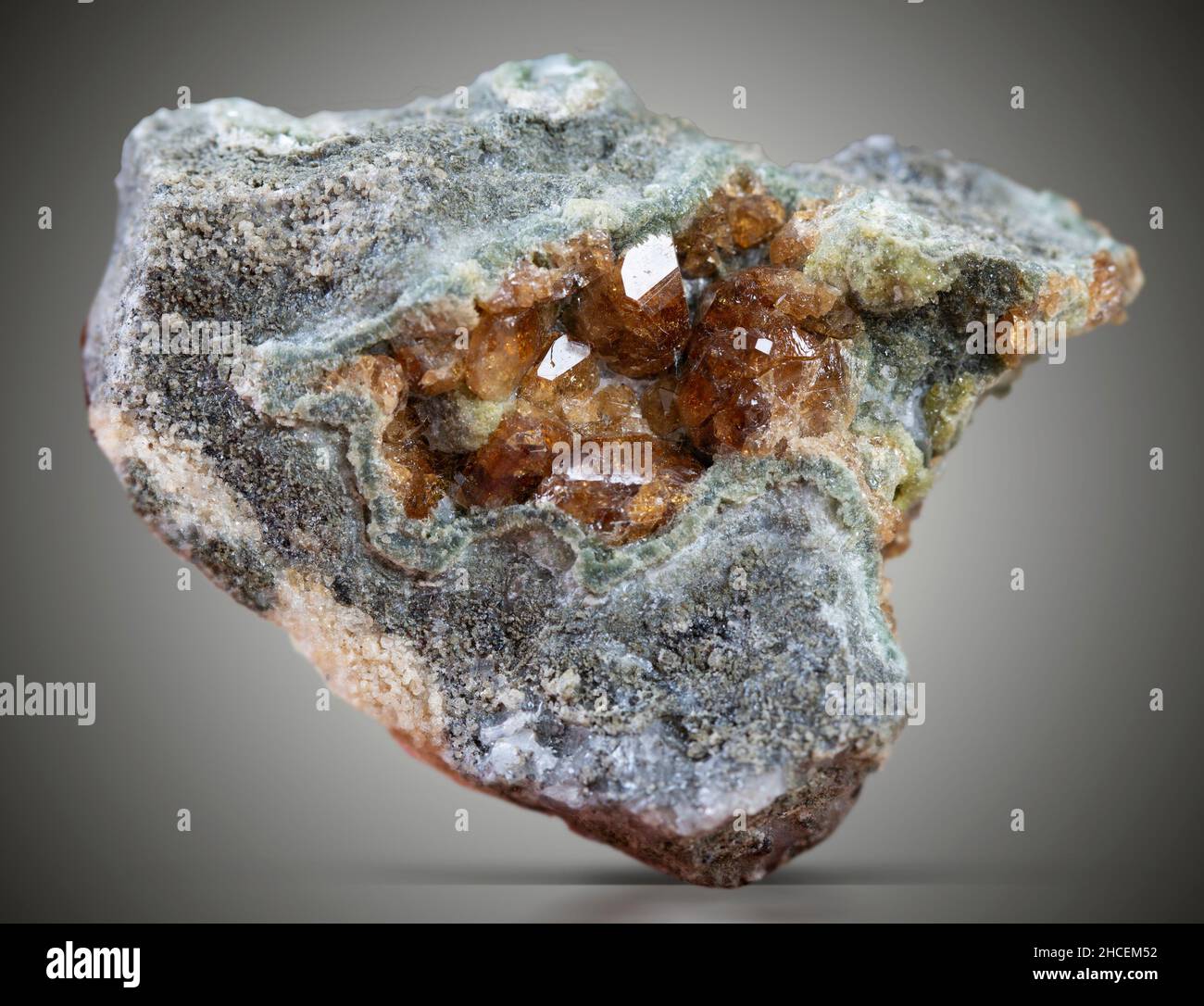 garnet mineral specimen stone rock geology gem crystal Stock Photo - Alamy