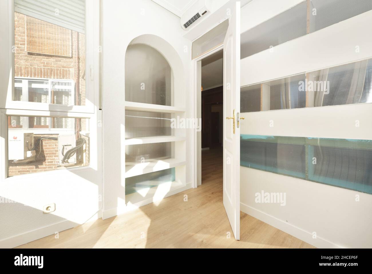 Study with built-in shelving on a closed terrace with good rays of sun ...