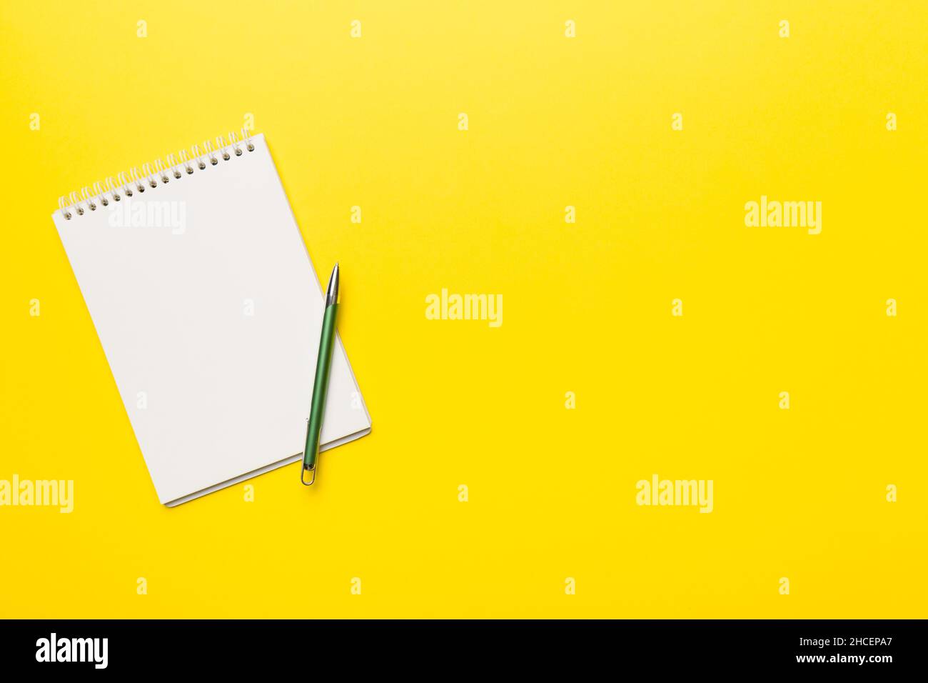 Blank notebook with pen on white background. Back to school and ...