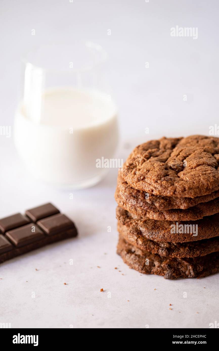 Chocolate chip cookies with milk Stock Photo - Alamy
