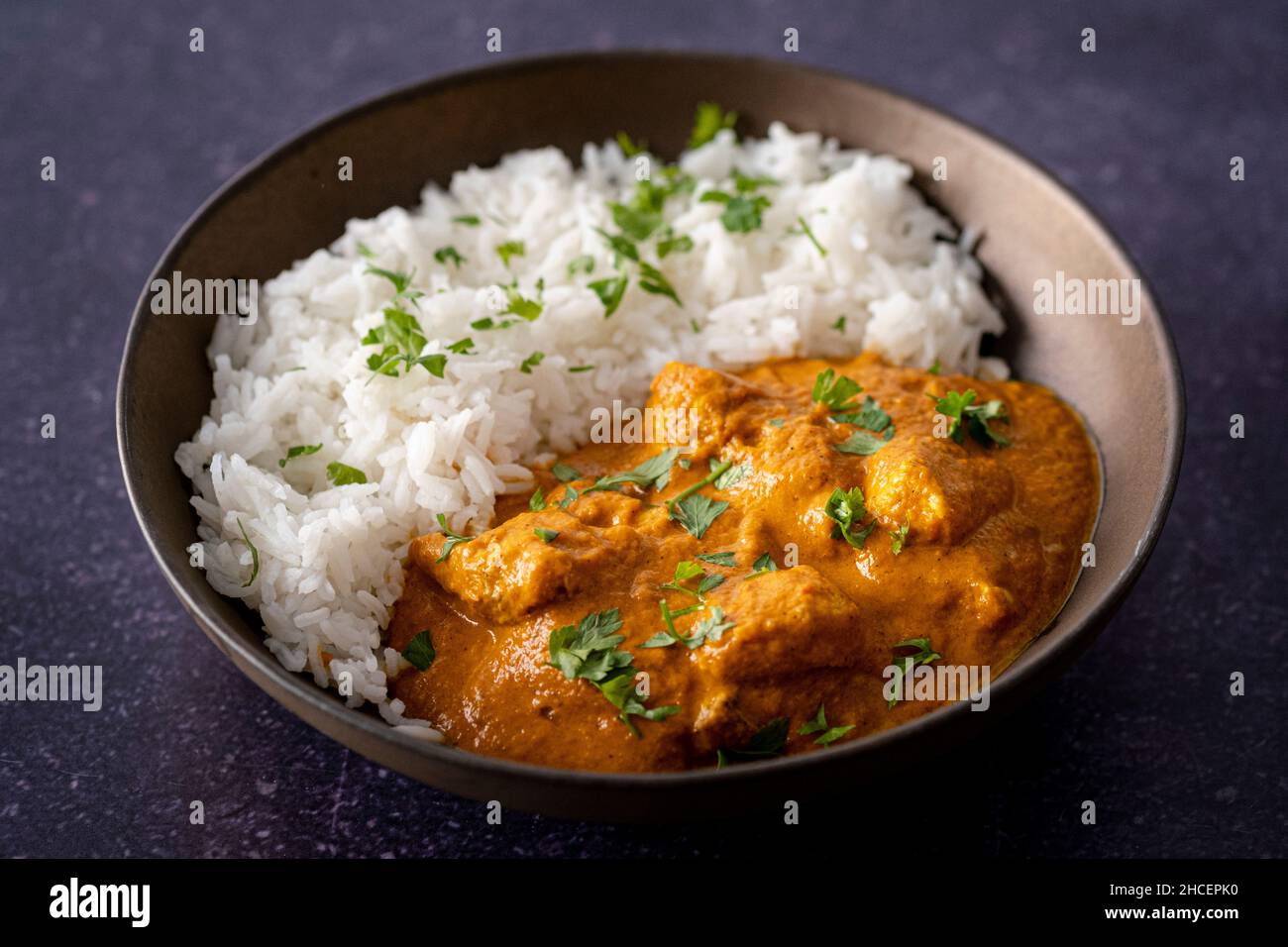 Chicken tikka masala with basmati rice Stock Photo - Alamy