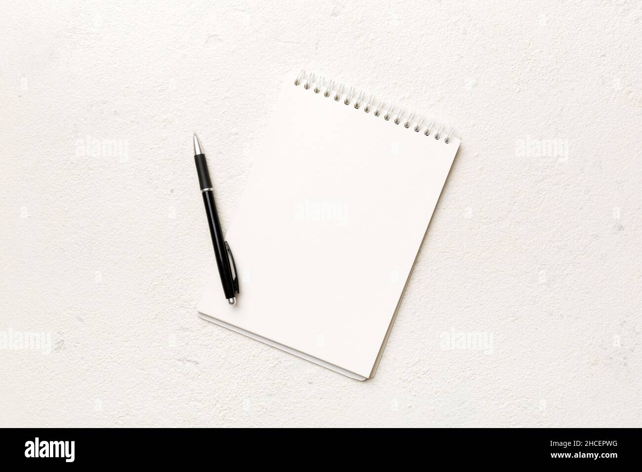 Blank notebook with pen on white background. Back to school and ...