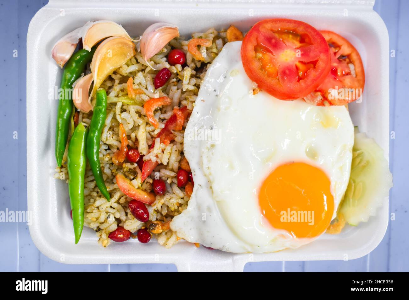 Famous tea leaf and rice salad called laphet htamin. Favorite street ...