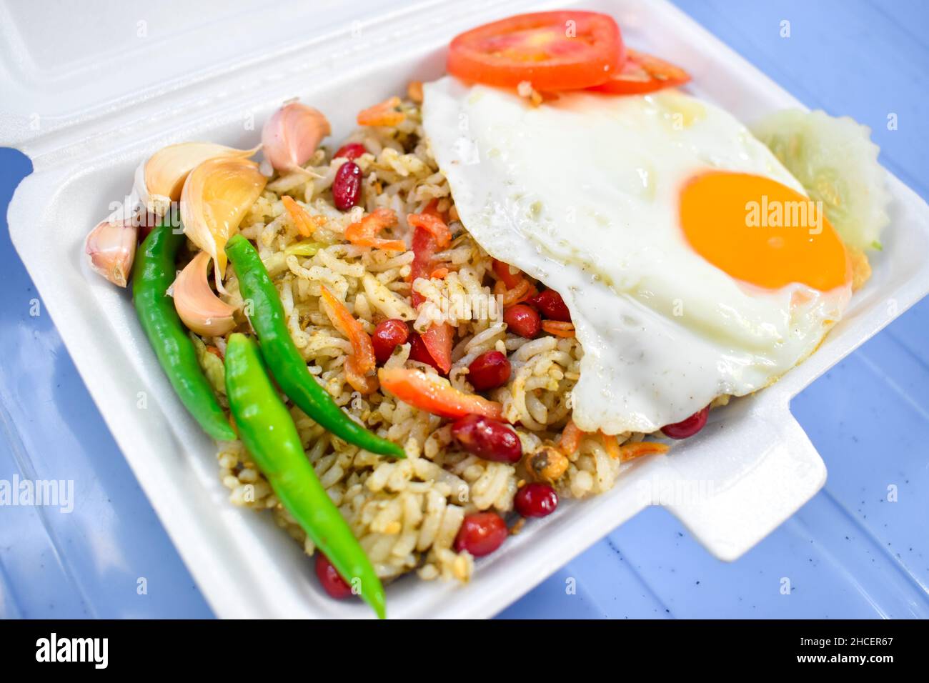 Famous tea leaf and rice salad called laphet htamin. Favorite street ...