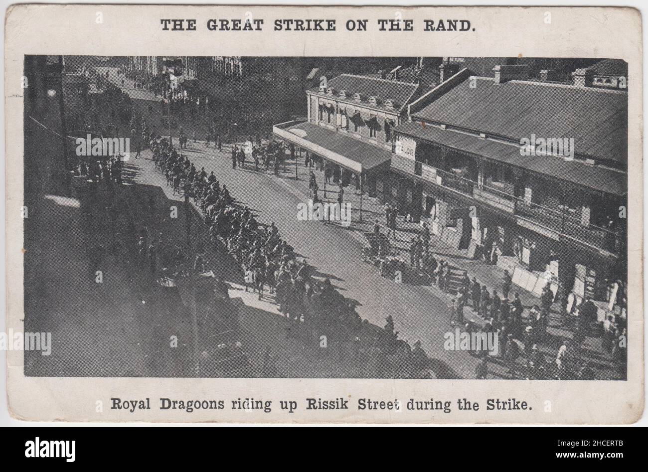 'The great strike on the Rand. Royal Dragoons riding up Rissik Street ...