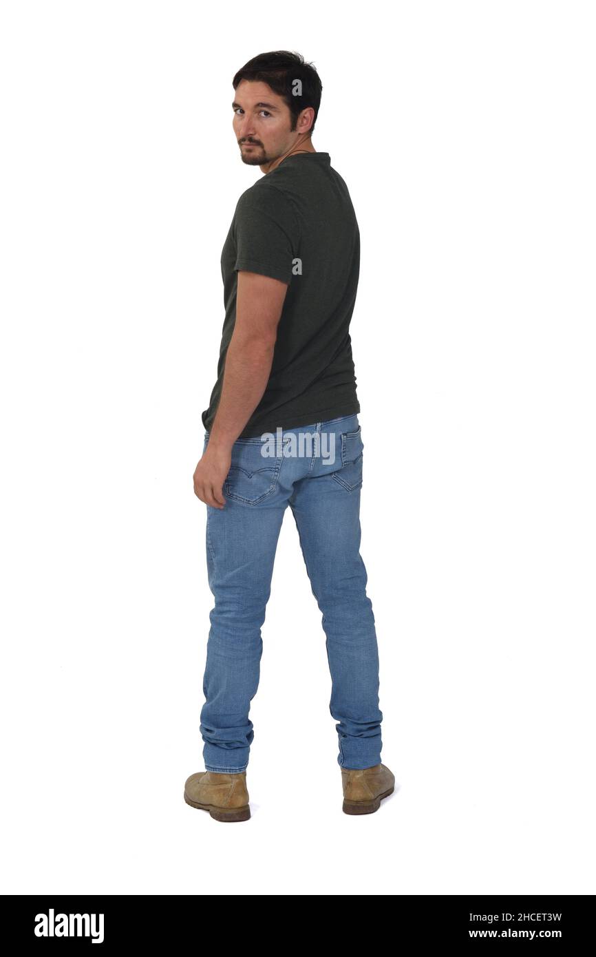 full portrait of rear view of man looking at camera on white background ...