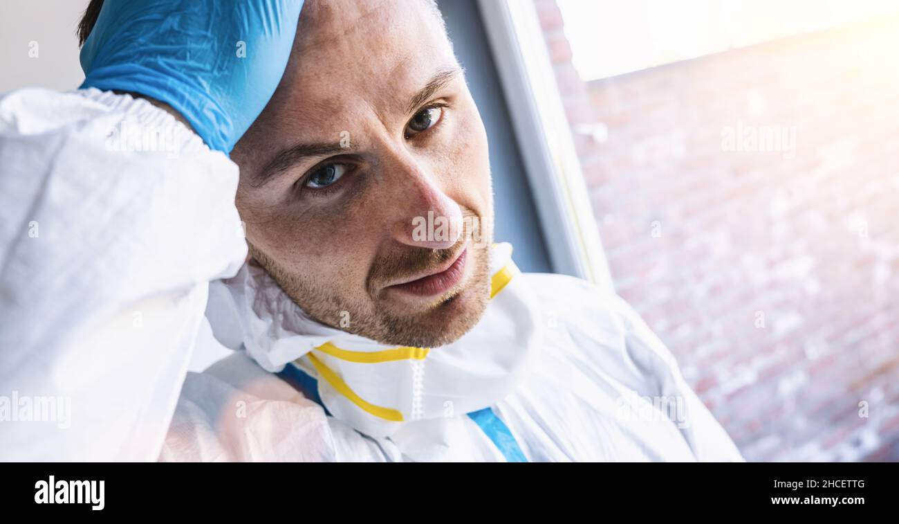 Exhausted clinician in intensive care unit in coronavirus covid-19 ...