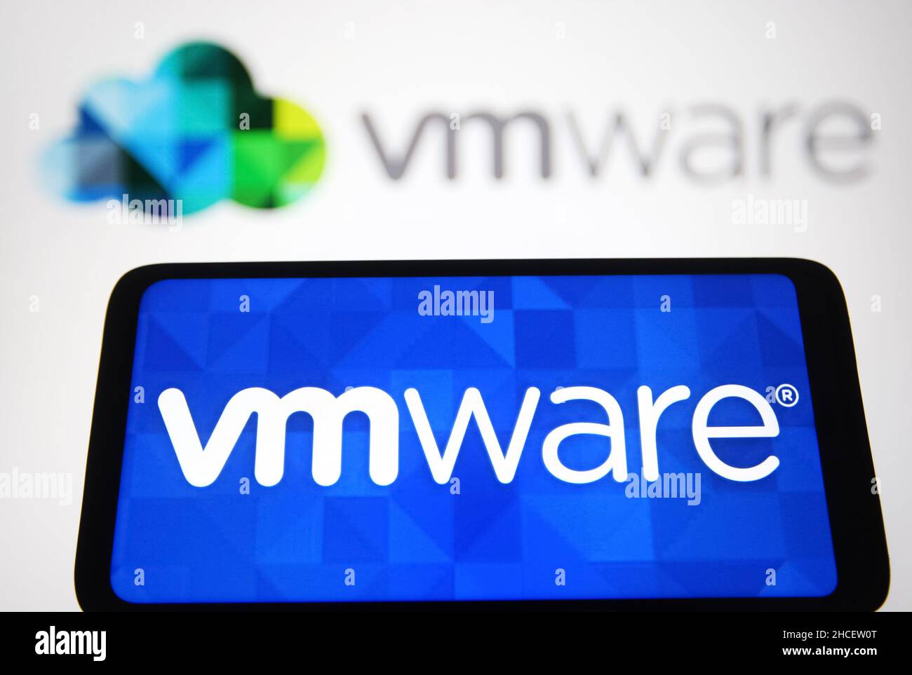 In this photo illustration, VMware Inc. logo of a cloud computing and ...