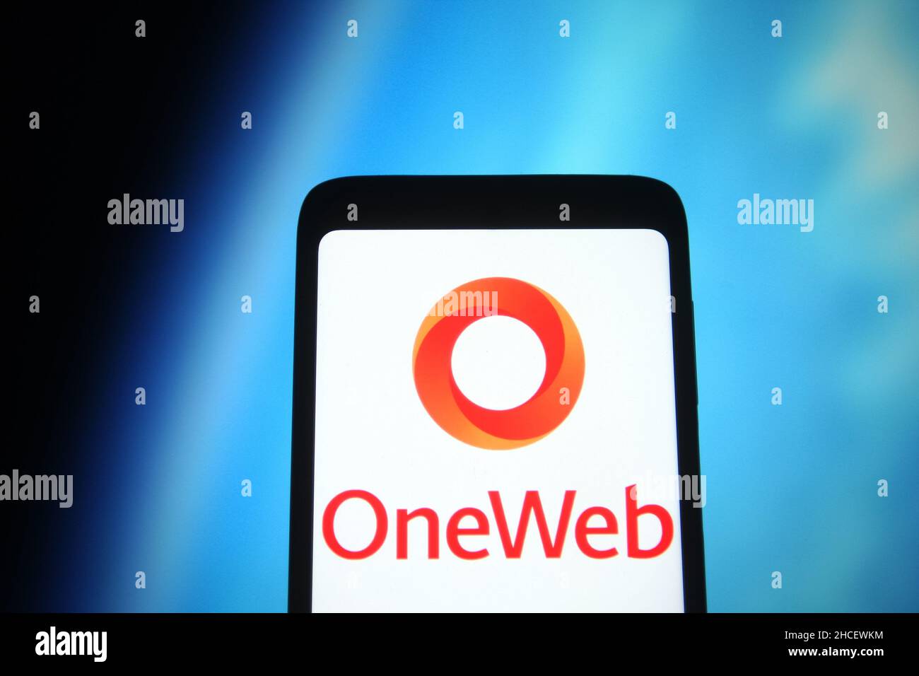 Ukraine. 28th Dec, 2021. In this photo illustration, OneWeb satellite constellation logo is seen ...