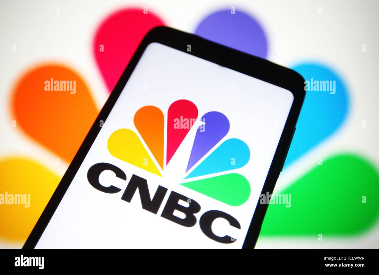 In this photo illustration, CNBC (Consumer News and Business Channel) logo is seen on a ...