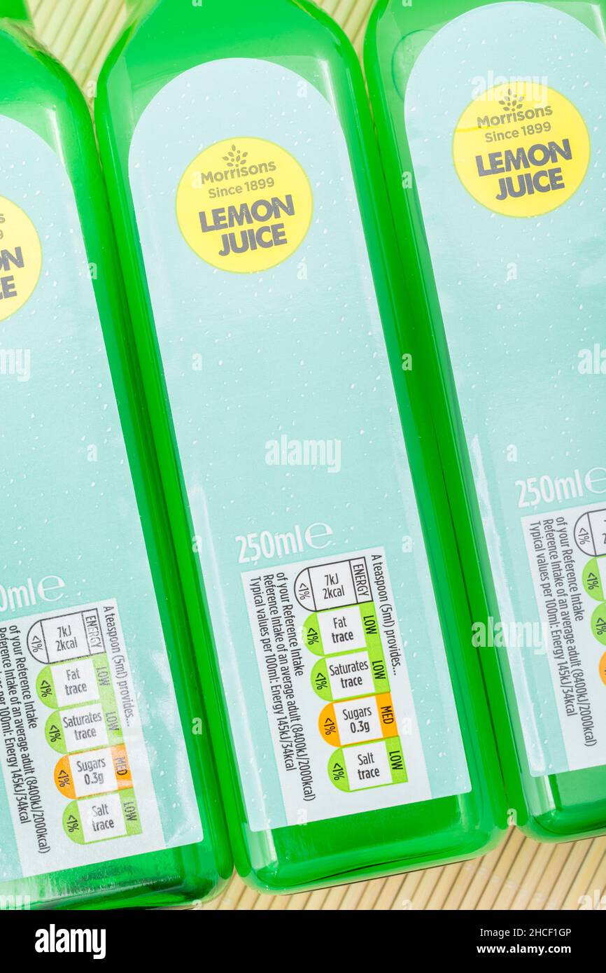 Plastic bottle of Morrison's supermarket own-label lemon juice. For own ...