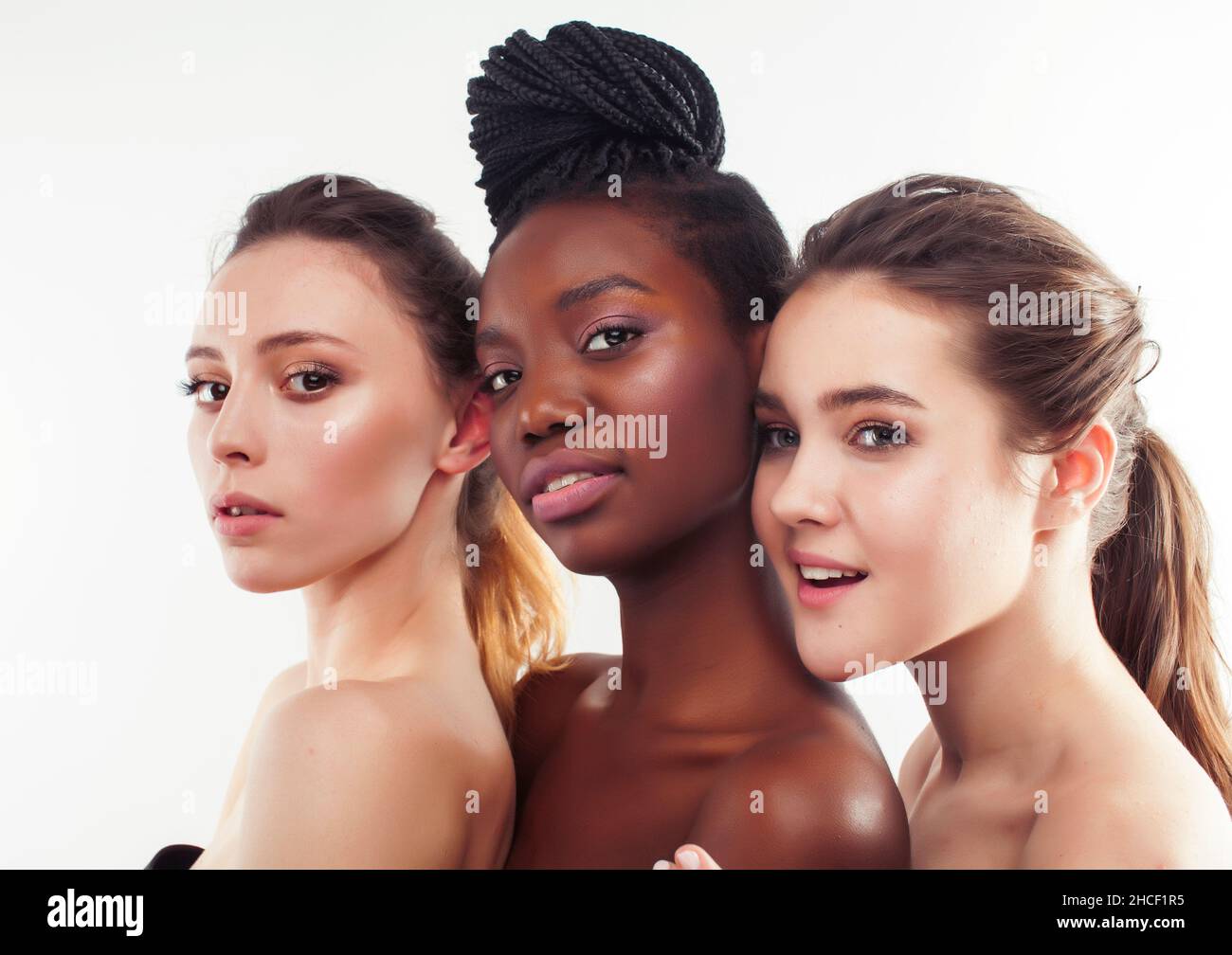 three different nation woman: african-american, caucasian together ...