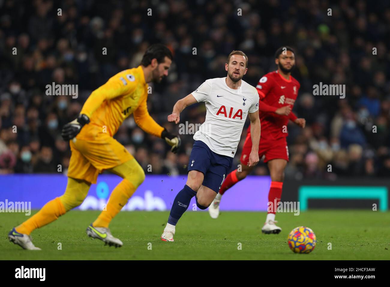Harry Kane of Tottenham Hotspur seen in action with Alisson Becker and ...