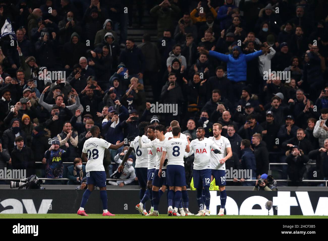 Tottenham Hotspur players and fans celebrate the opening goal scored by ...