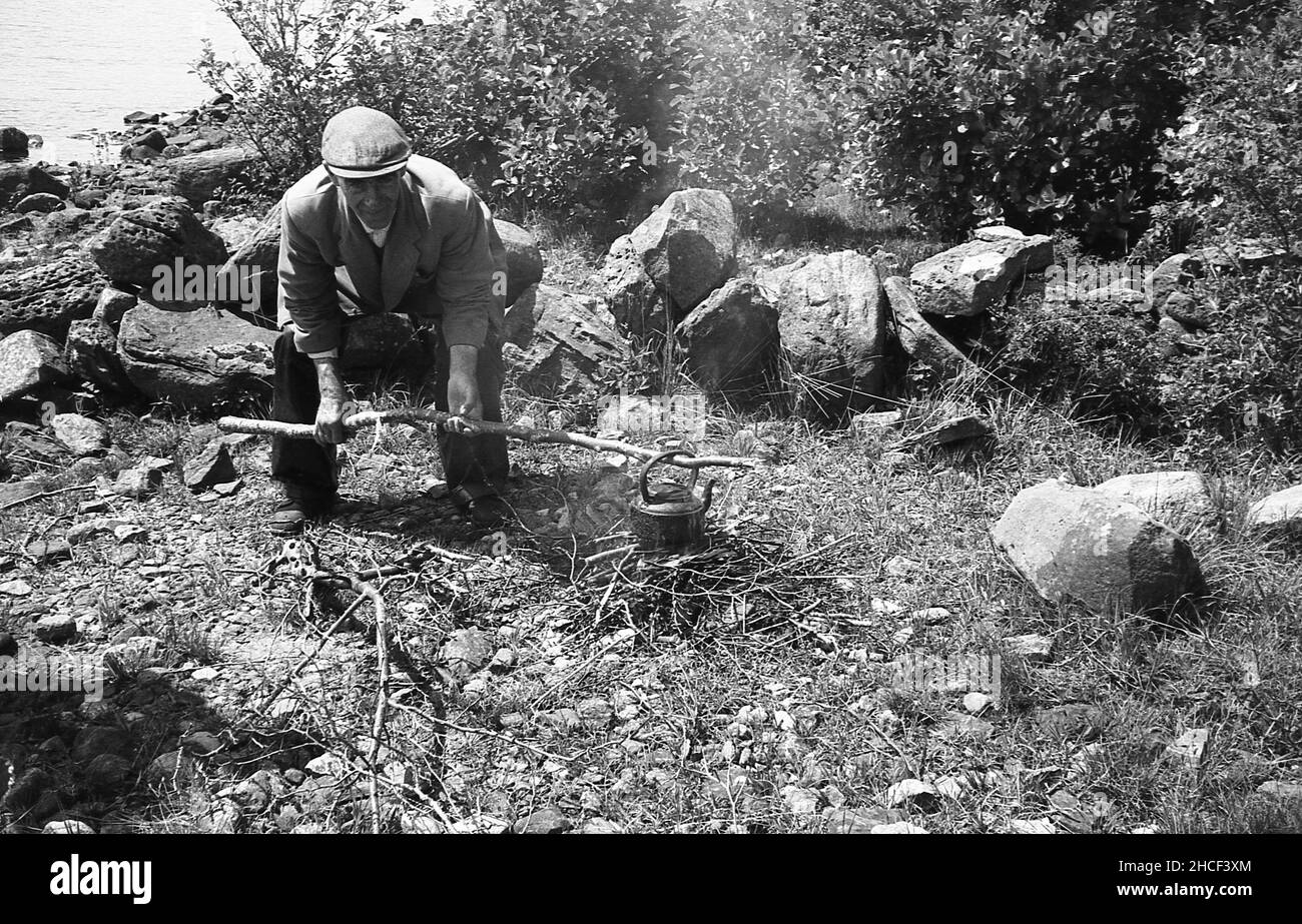 Sitting beside fire hi-res stock photography and images - Alamy